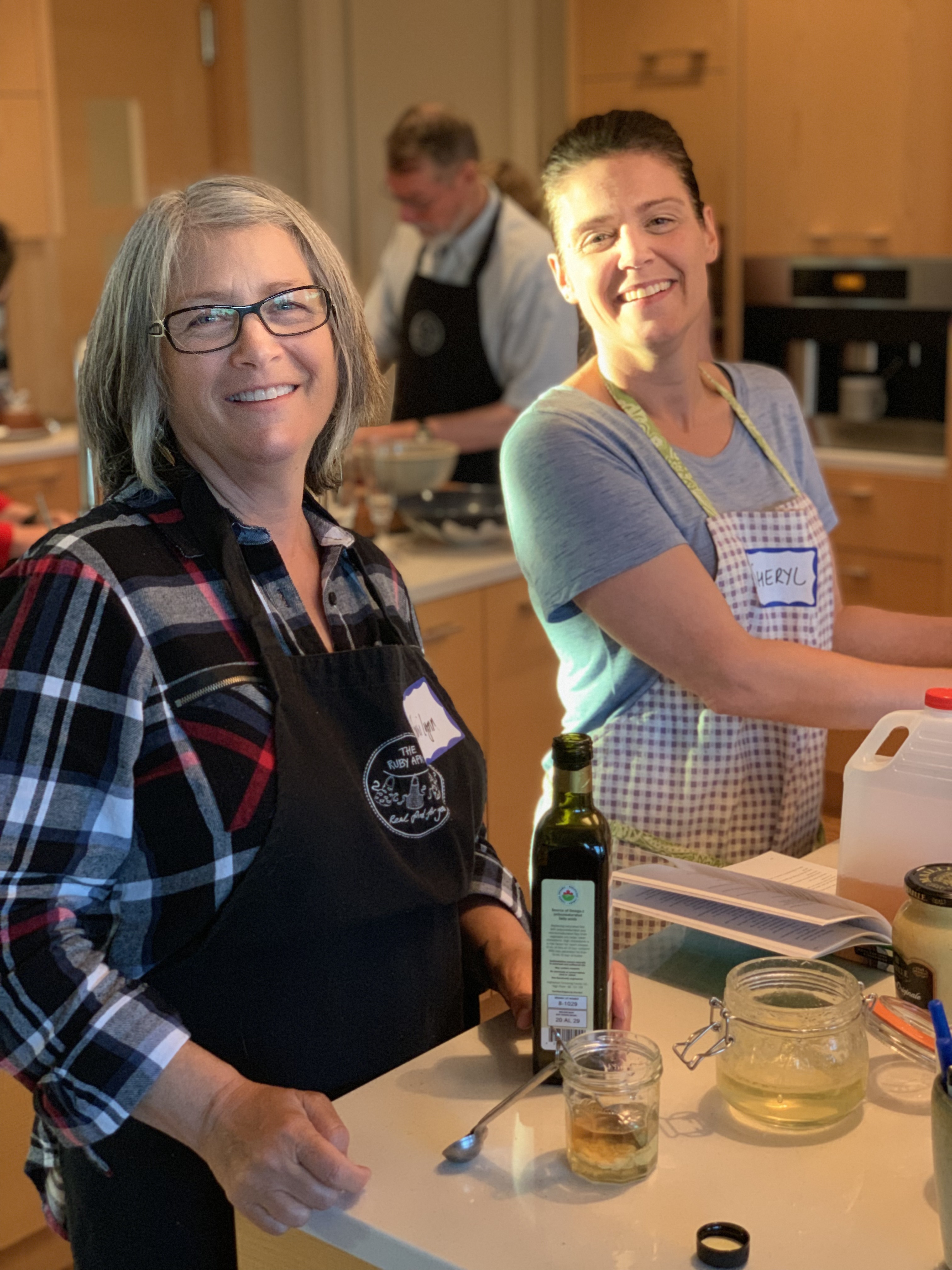 Students at AWN Kitchen cooking school in Edmonton – Savour It All